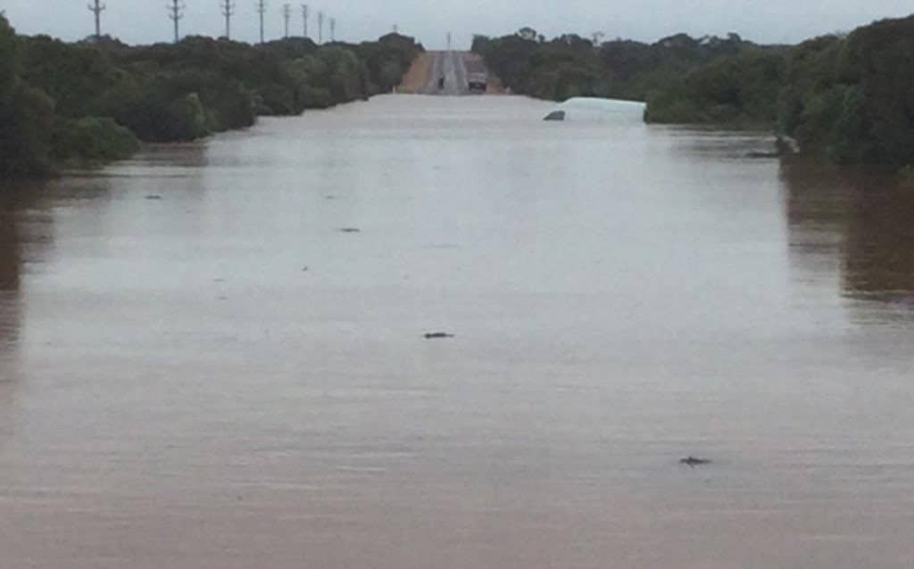 Record rainfall floods major SA highways and cuts off towns
