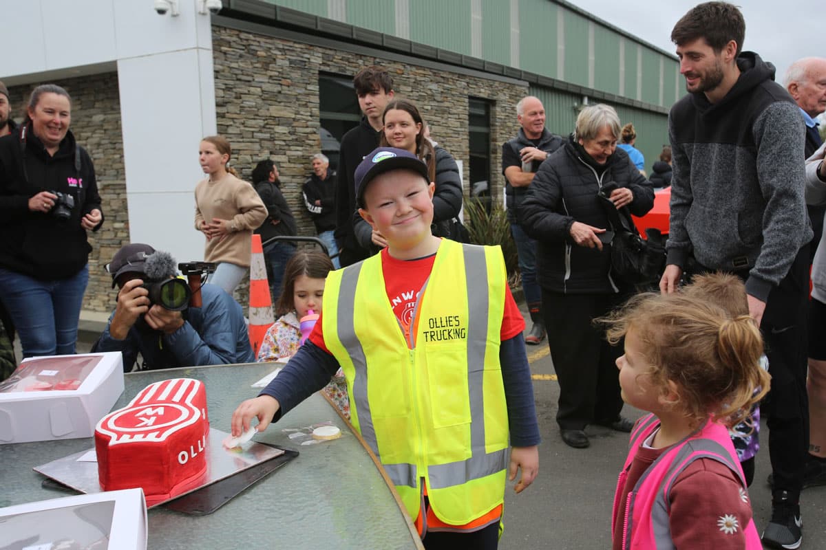 Over 60 trucks surprise young truck fan for his eighth birthday
