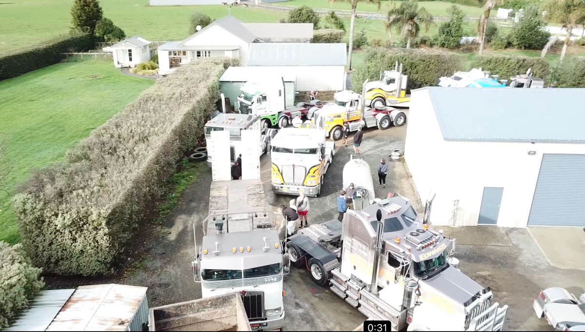 Over 60 trucks surprise young truck fan for his eighth birthday
