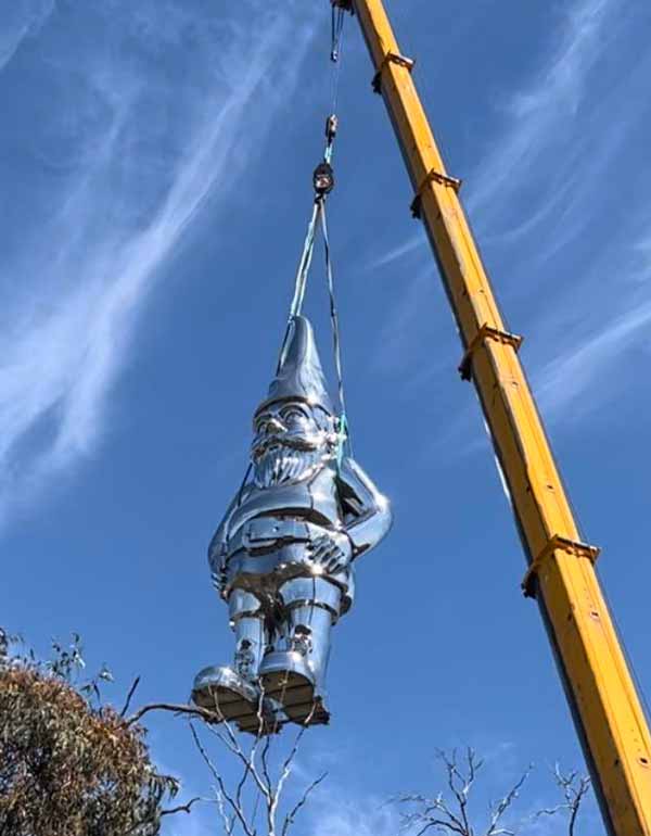 Giant chrome garden gnome hits the road