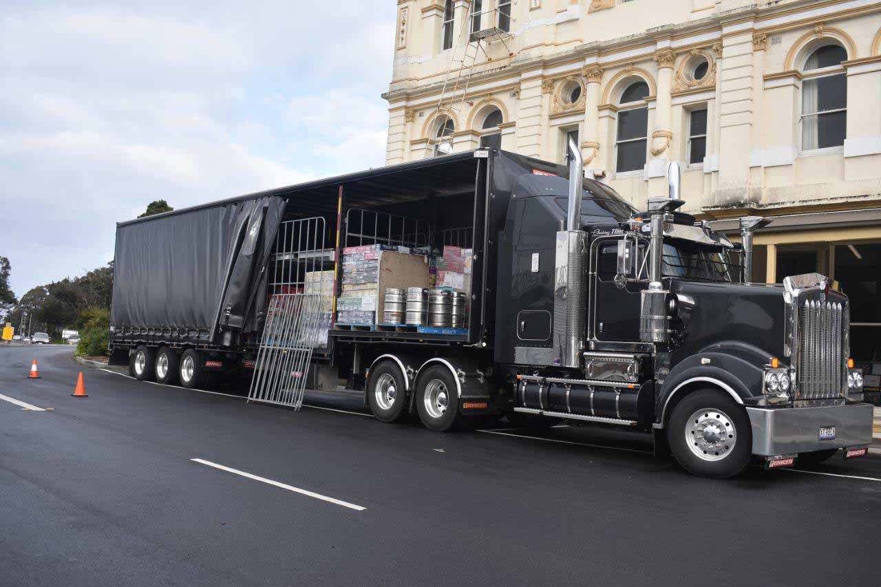 Cheers to that! Truckie takes us on the 'booze run' around southwest Tassie